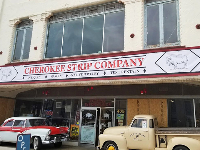 Cherokee Strip Company's vintage sign promises a journey through Oklahoma's past. Antiques, quilts, and stories await the curious shopper.