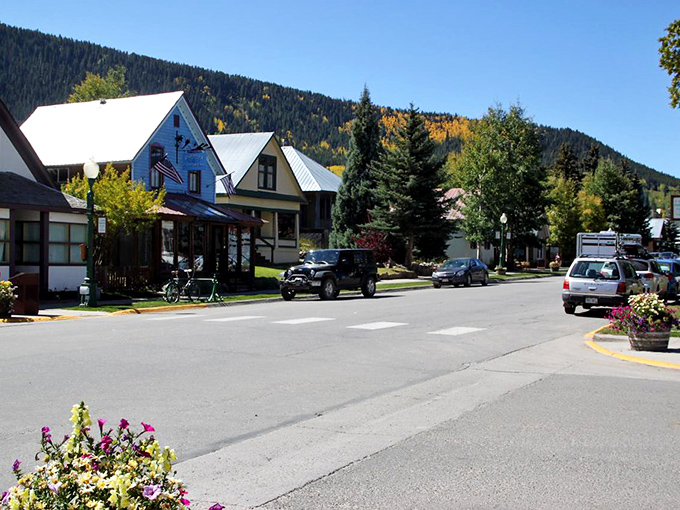 Crested Butte: Fall colors paint the mountainside while historic buildings stand proudly, as if posing for their annual family portrait.