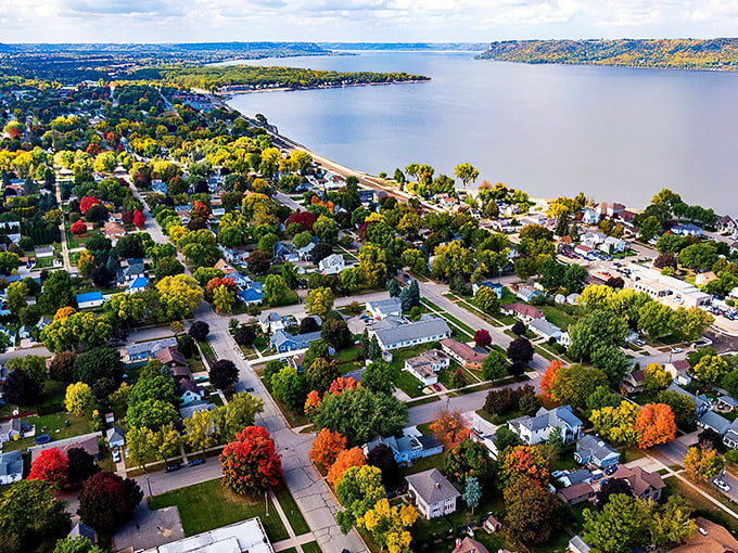 Fall colors frame Lake City's waterfront like nature's own masterpiece—no filter needed for this Mississippi River gem.