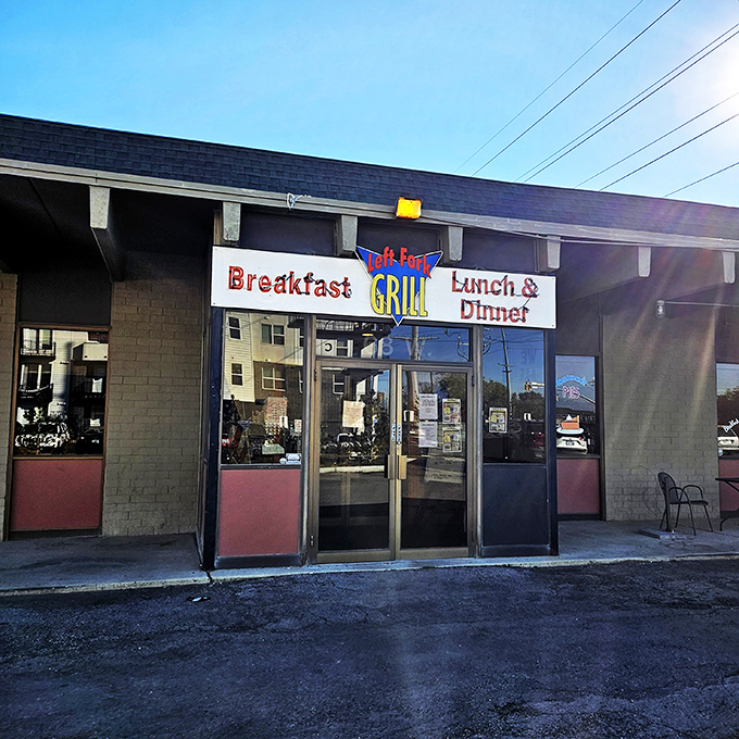Blue building, red sign, and a promise of "Breakfast, Lunch & Dinner" that Left Fork Grill delivers on with delicious authority.