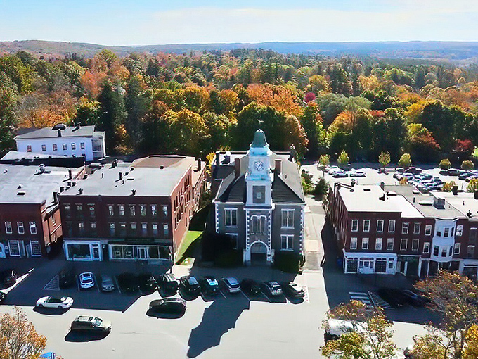 Aerial view of Litchfield shows the perfect town square surrounded by autumn's fiery display &ndash; Mother Nature's love letter to Connecticut.