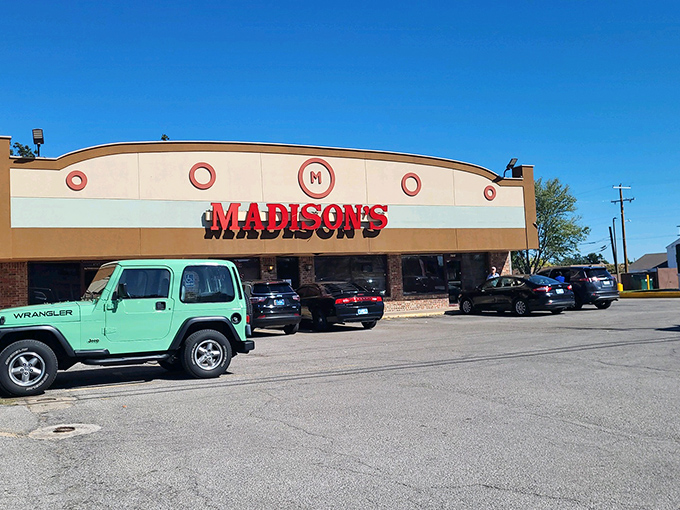 Madison's curved facade stands like a beacon for breakfast lovers. Those biscuits and gravy are calling your name!