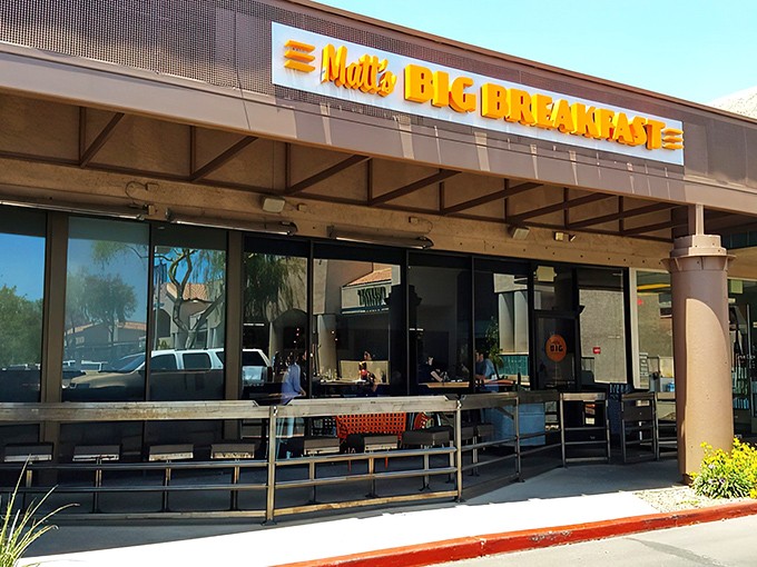 The neon sign promises "BIG BREAKFAST" and inside, plates deliver on that promise with spectacular authority.