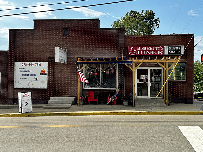 At Miss Betty's, even the building wears patriotic pride. Those red chairs aren't just for sitting&mdash;they're recovery zones for post-biscuit bliss.