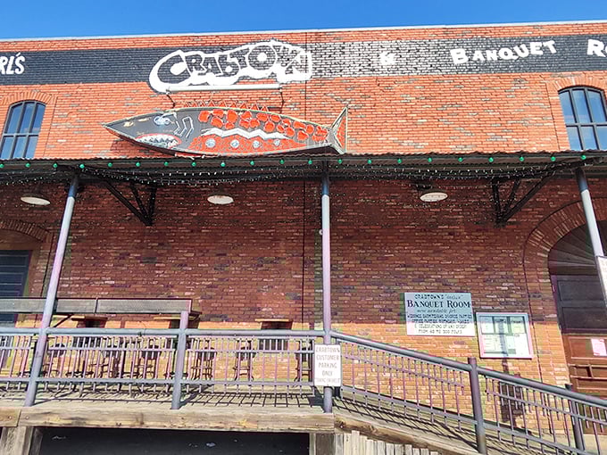 That vintage fish sign isn't just decoration&mdash;it's a beacon calling all seafood lovers to Pearl's Crabtown's flavor-packed treasures.