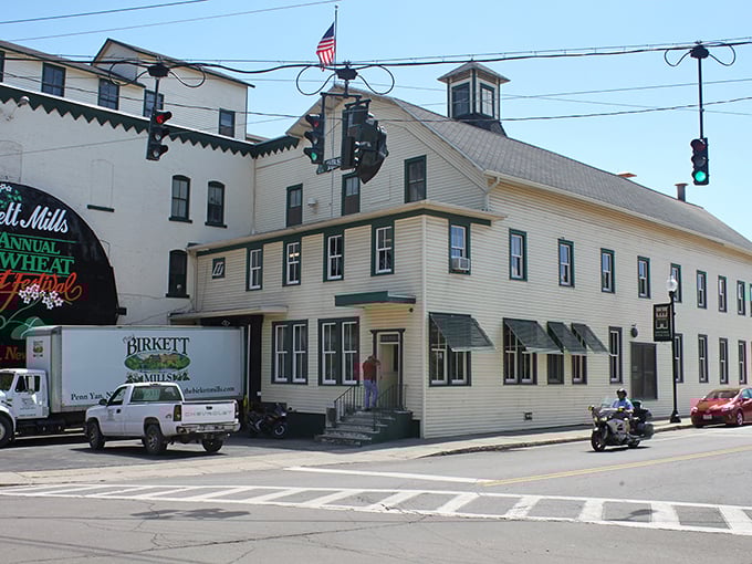 The historic Birkett Mills stands as Penn Yan's steadfast landmark, grinding away the years while the town keeps prices ground down too.