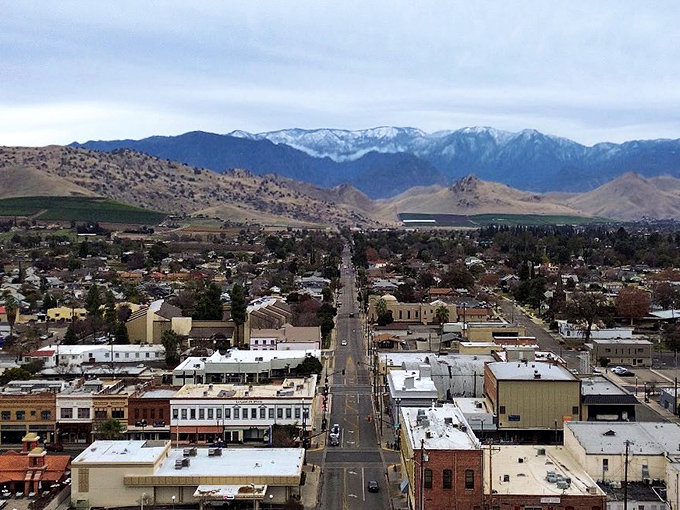 Snow-capped Sierra Nevadas watch over Porterville like gentle giants, providing a stunning backdrop to this affordable retirement haven.