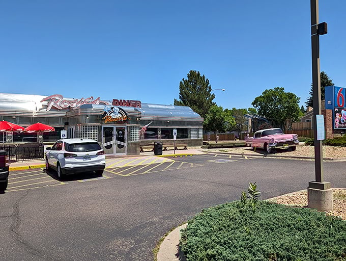 Chrome, neon, and nostalgia! Rosie's Diner stands proud against Colorado's blue skies, promising burgers that would make the Fonz give two thumbs up.