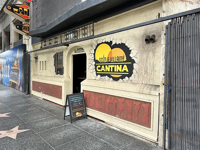 The Scum and Villainy Cantina beckons space travelers with its glowing sign. May the fork be with you!