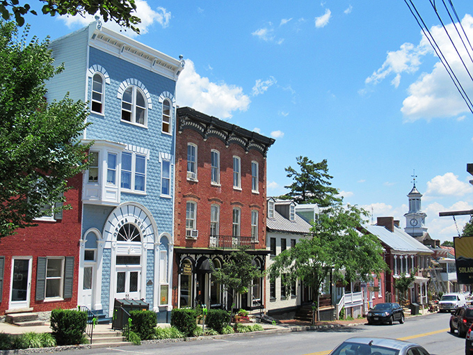 The blue Victorian beauty of Shepherdstown pops against its brick neighbors&mdash;architectural harmony that would make Frank Lloyd Wright smile.