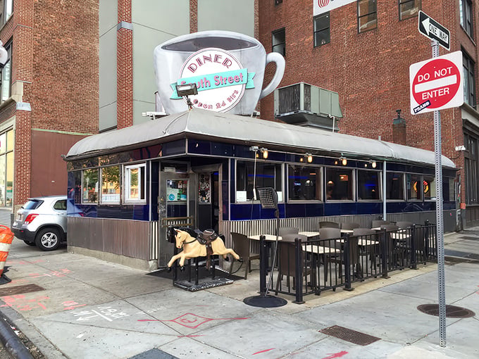 This urban diner looks like it was plucked straight from an Edward Hopper painting, serving dreams with a side of hash browns.