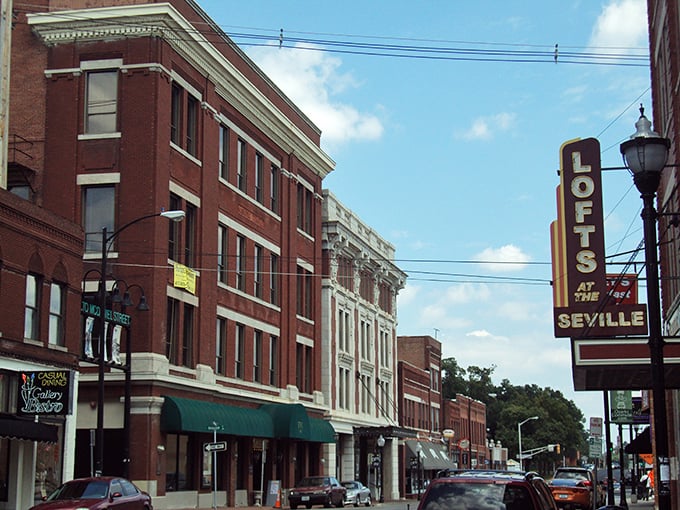 Seville Square in Springfield captures that perfect small-town vibe. The vintage marquee promises entertainment while the architecture whispers of simpler times.