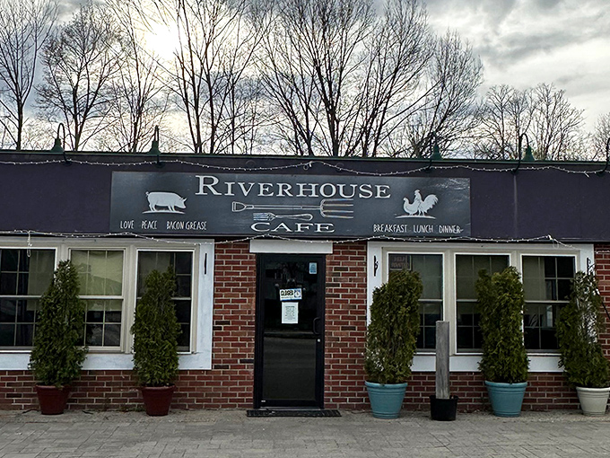 Winter's bare trees frame the Riverhouse Caf&eacute;'s inviting entrance. Inside awaits the kind of breakfast that makes New Hampshire mornings bearable.
