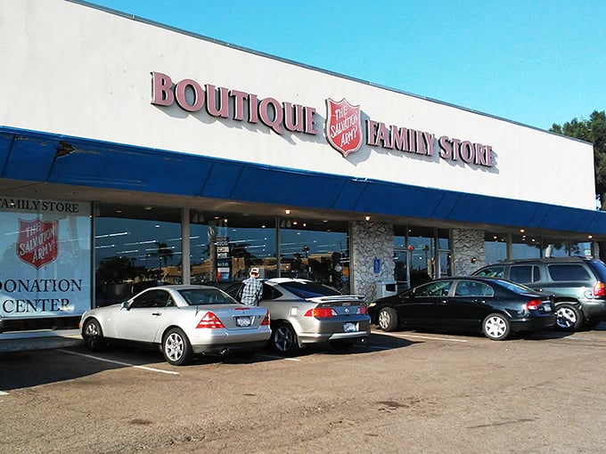 Stone accents and that iconic red shield beckon bargain seekers inside for treasures that help fund community programs.