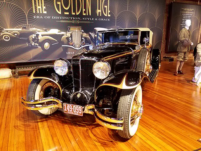 This sleek black beauty from "The Golden Age" exhibit showcases why the 1930s represented the pinnacle of automotive elegance and craftsmanship.