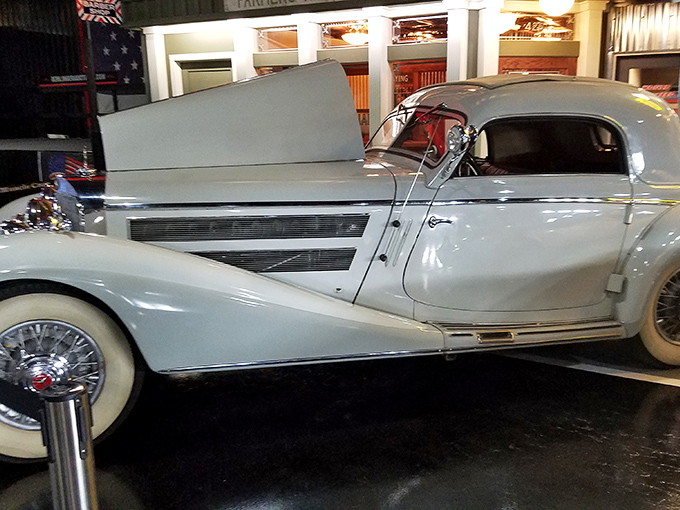 Elegance on wheels! This pristine white classic with its sweeping fenders and spoke wheels isn't just transportation&mdash;it's automotive aristocracy from a more graceful era.
