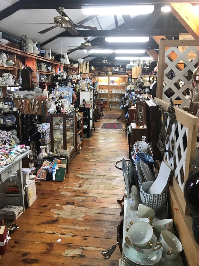 Wooden floors creak beneath your feet as you navigate this maze of memories, each booth offering its own universe of collectibles waiting to be discovered.
