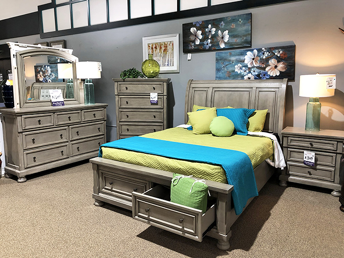 This bedroom set doesn't just offer storage&mdash;it's staging an intervention for your cluttered nightstand. The clever drawer in the footboard is where organization dreams come true.