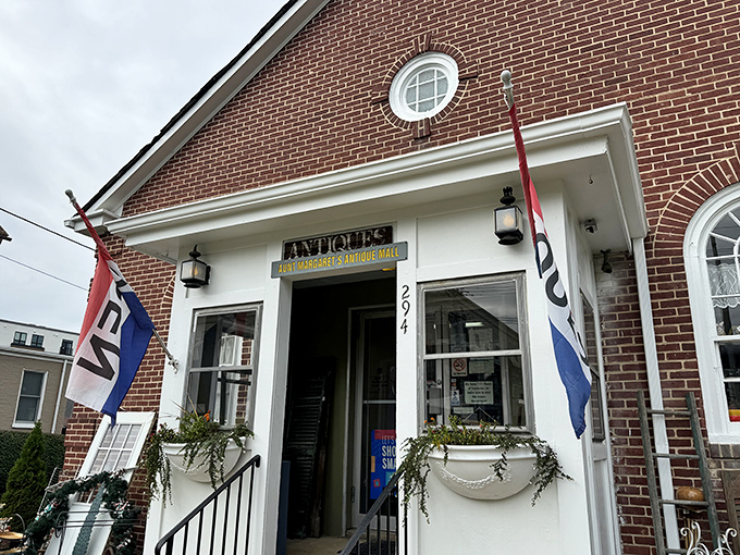Aunt Margaret's Antique Mall welcomes treasure hunters with its distinctive round window and promise of discoveries waiting just beyond those doors.