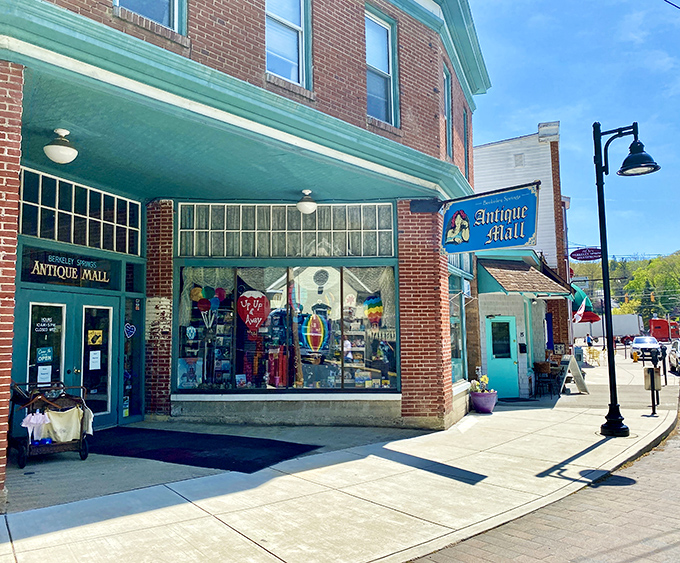 The Antique Mall promises treasure hunting at its finest, where yesterday's ordinary becomes today's conversation piece under that distinctive turquoise awning.