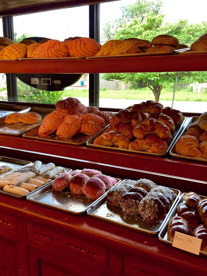 Golden-brown conchas, flaky pastries, and colorful treats line up like edible works of art. This display case isn't just a showcase&mdash;it's a portal to Mexico.