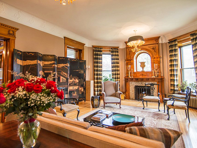 Coral walls and golden woodwork create a dining space that makes your average breakfast feel like a state dinner. Pass the syrup, Mr. President!