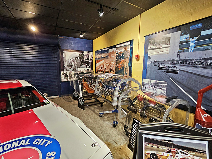 Peek behind racing's curtain with this display of a stock car's skeleton. The mechanical ballet that makes left turns into an art form.