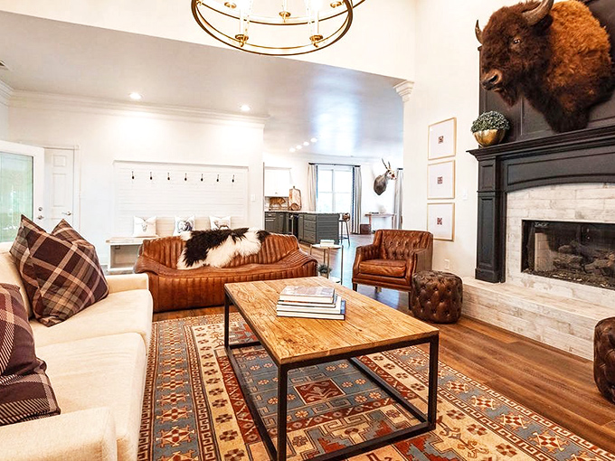 Rustic luxury defines the common areas, where buffalo mounts and leather furnishings create a space that's equal parts medieval manor and Kentucky lodge.