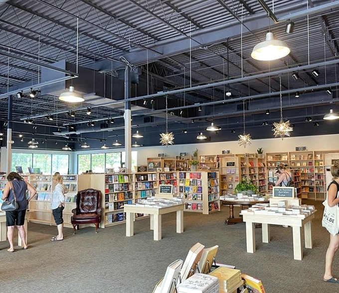 High ceilings, pendant lights, and wooden shelves create the perfect atmosphere for losing track of time while finding your next favorite author.