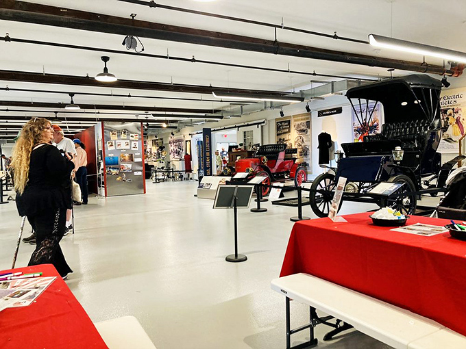 Inside this mechanical wonderland, vintage automobiles gleam under the lights, each one telling stories of roads long traveled.