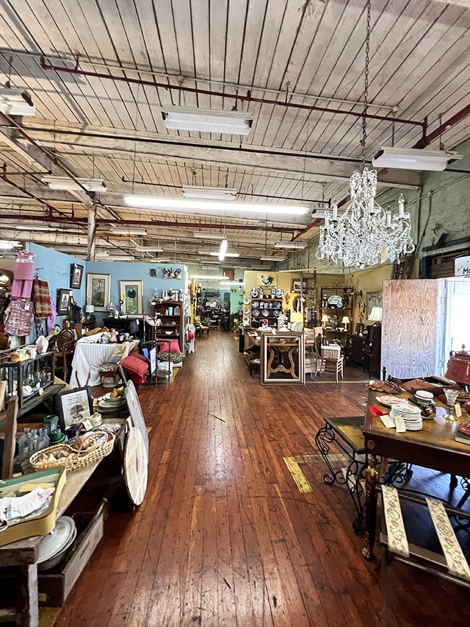 Crystal chandeliers hanging from industrial ceilings? It's like Downtown Abbey decided to move into a factory, and somehow it works beautifully.