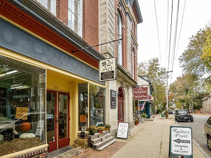 The 2nd Act Antiques storefront beckons with treasures that have stories longer than your grandmother's holiday dinner tales. Window shopping here is time travel.