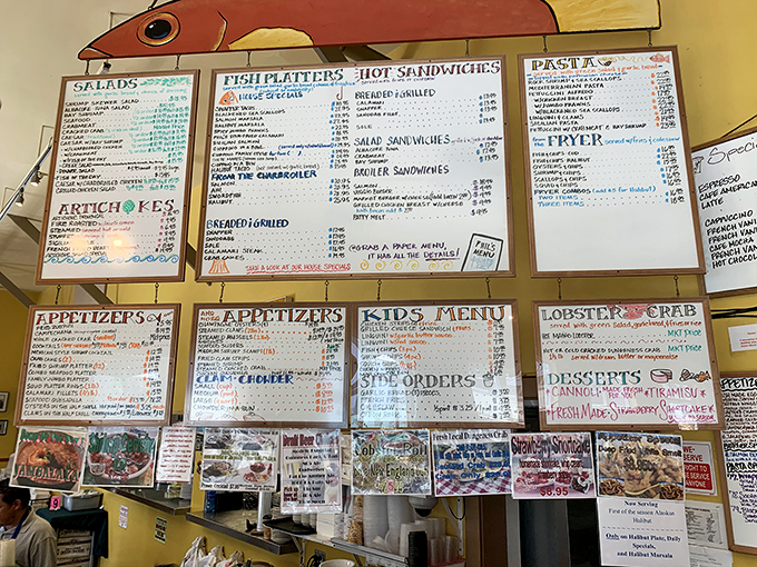 The menu board at Phil's is like a maritime treasure map—overwhelming at first glance, but promising delicious discoveries for the adventurous soul.