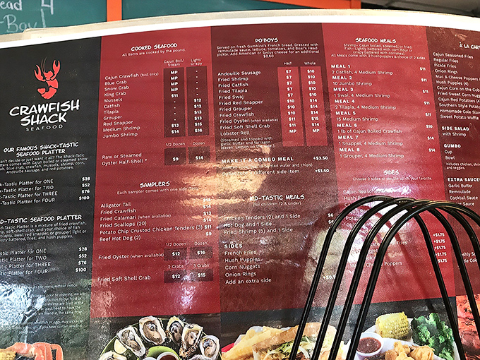 The wall-mounted menu doubles as a seafood lover's bucket list. Each item beckons with the silent promise of "you'll be back for me next."