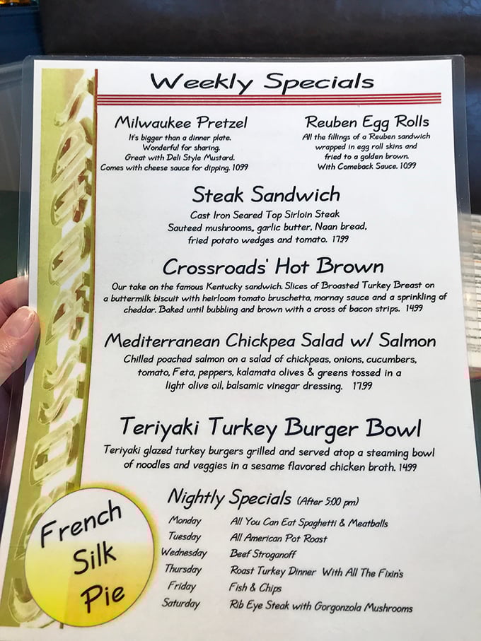 The weekly specials menu reads like a love letter to comfort food. That Milwaukee Pretzel "bigger than a dinner plate" isn't kidding around.