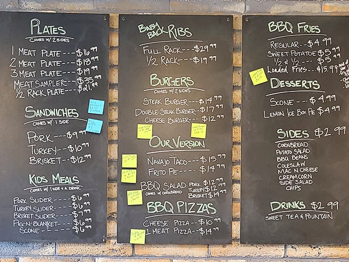 The chalkboard menu at Smokin Bones is like a treasure map for your taste buds. X marks the spot where your diet plans walk the plank.