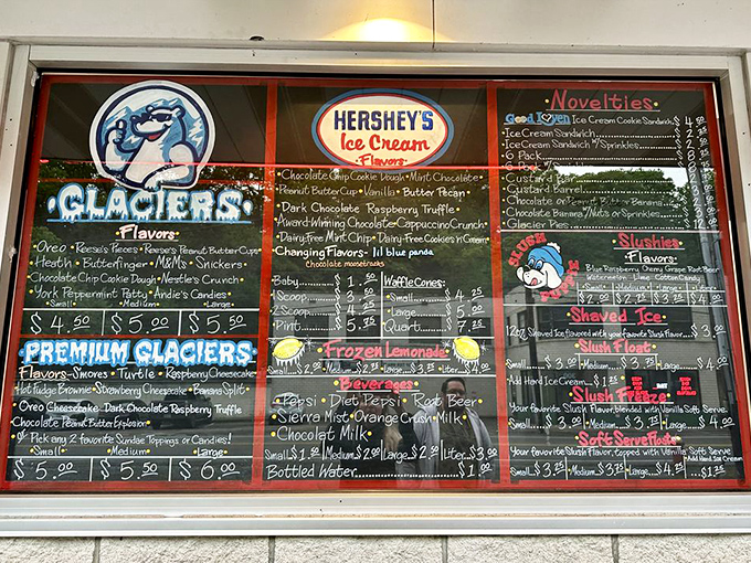 The menu board at Custard's reads like a roadmap to happiness, with "Glaciers" serving as the expressway to flavor nirvana.