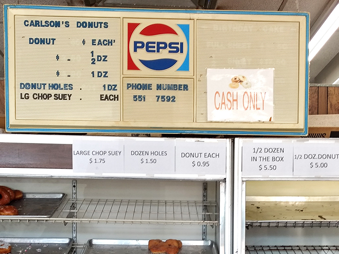 That vintage menu board is a time machine &ndash; complete with retro Pepsi logo and prices that make you wonder if you've stepped into a Norman Rockwell painting.