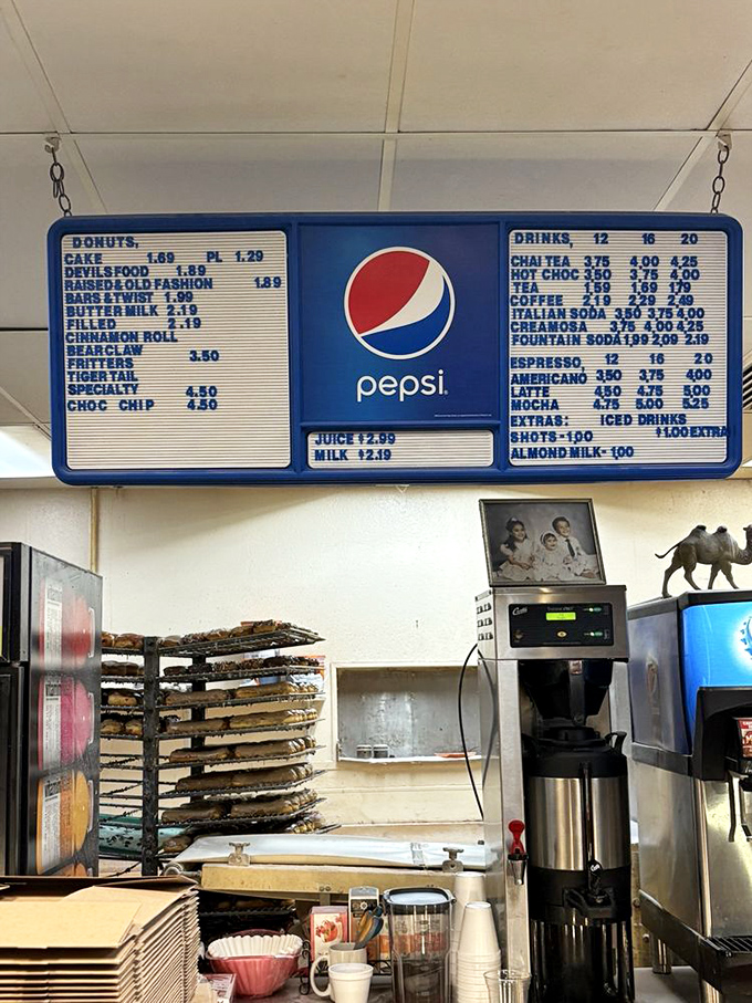 The menu board tells a beautiful story of donut democracy&mdash;from humble cake donuts to the legendary "Fritters" commanding top dollar for good reason.