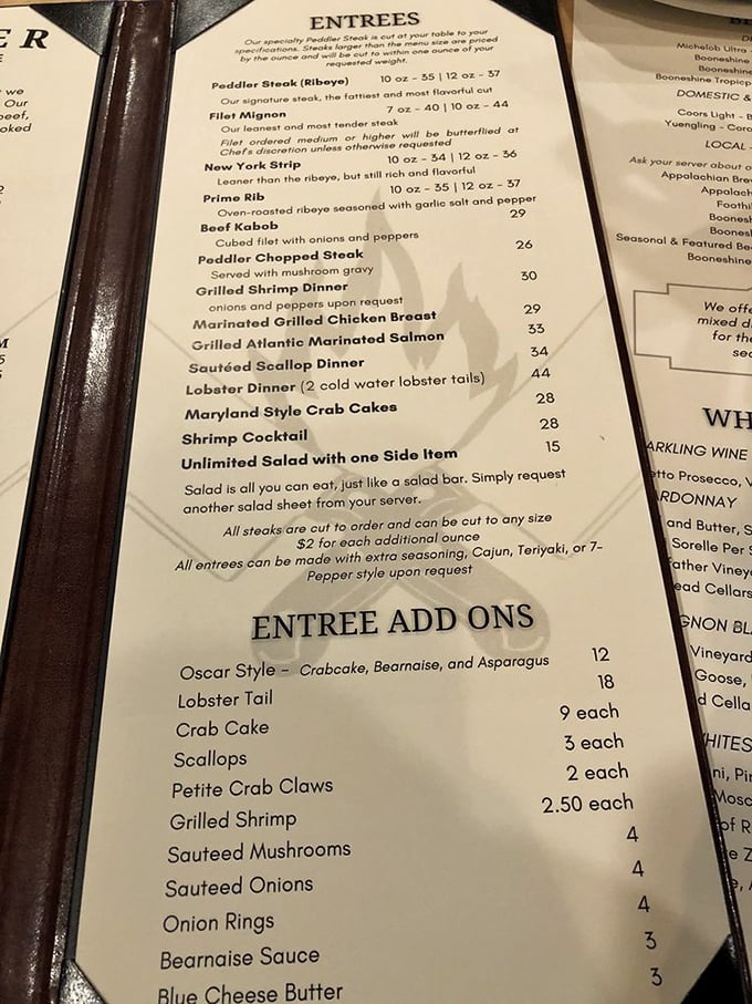 A menu that gets straight to the point – like a love letter to beef enthusiasts with just enough seafood options to keep the relationship interesting.