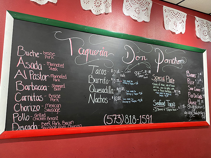 The handwritten chalkboard menu tells you everything you need to know – they're focused on the classics, done right, no fancy explanations needed.