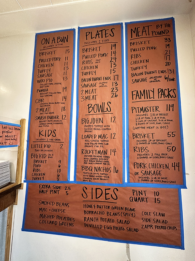 This hand-written menu board tells a delicious story&mdash;each item a chapter, each price a small admission fee to smoked meat heaven.