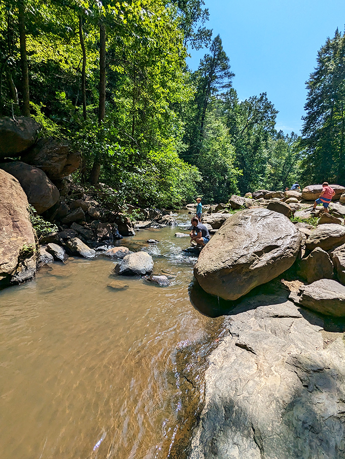Mother Nature's playground where kids explore stream-smoothed boulders while adults reconnect with their inner rock-hopping child.