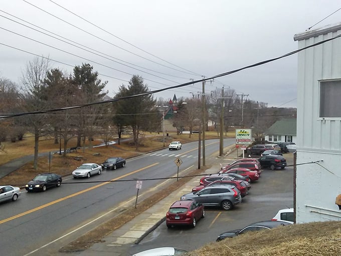 Morning light bathes Putnam's practical thoroughfares. Imagine running daily errands surrounded by this quintessential New England backdrop.