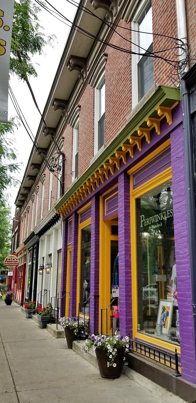 Periwinkles' vibrant purple and yellow fa&ccedil;ade stands out like a cheerful rebellion against the quaint brick backdrop of Rhinebeck's historic district.