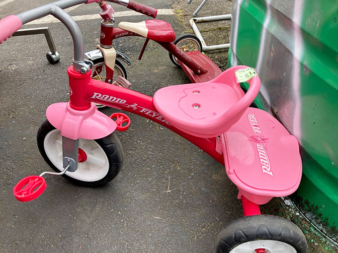 Remember that pink Radio Flyer you coveted as a kid? Someone's childhood memory awaits its next adventure outside Village Merchants.
