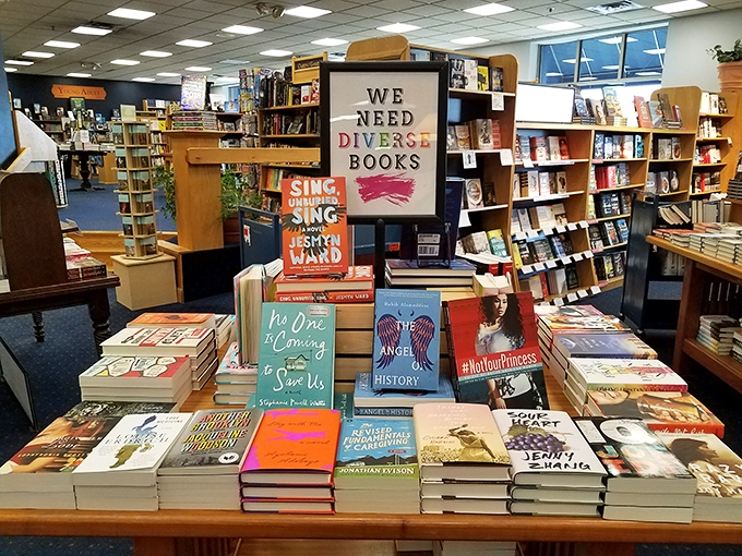 "We Need Diverse Books" isn't just a sign here &ndash; it's a mission statement displayed proudly among carefully curated titles waiting for curious minds.