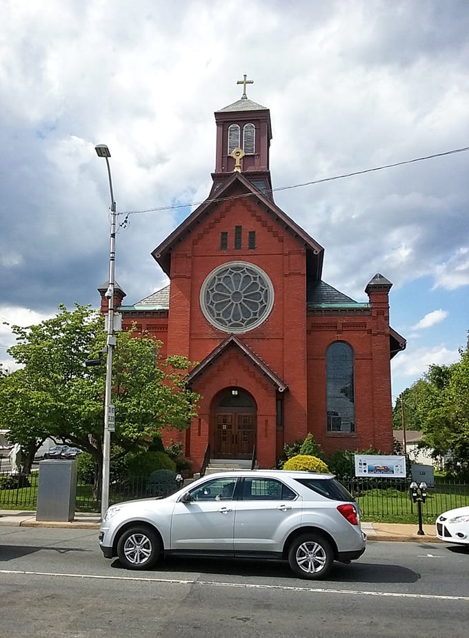 This striking red brick church stands as a testament to Newark's architectural heritage. Its rose window catches the light like a stained-glass sunburst.