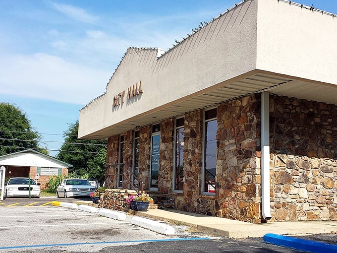 City Hall might not be imposing, but those stone walls have witnessed more authentic community decisions than most marble monuments ever will.