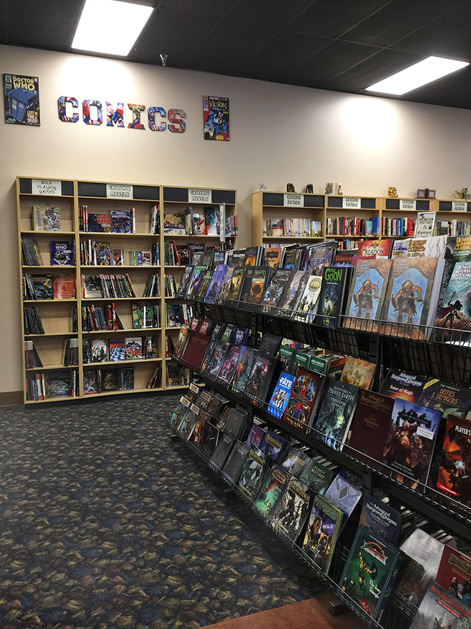The comics section isn't just shelves; it's a colorful timeline of illustrated storytelling where superheroes and indie characters coexist peacefully.